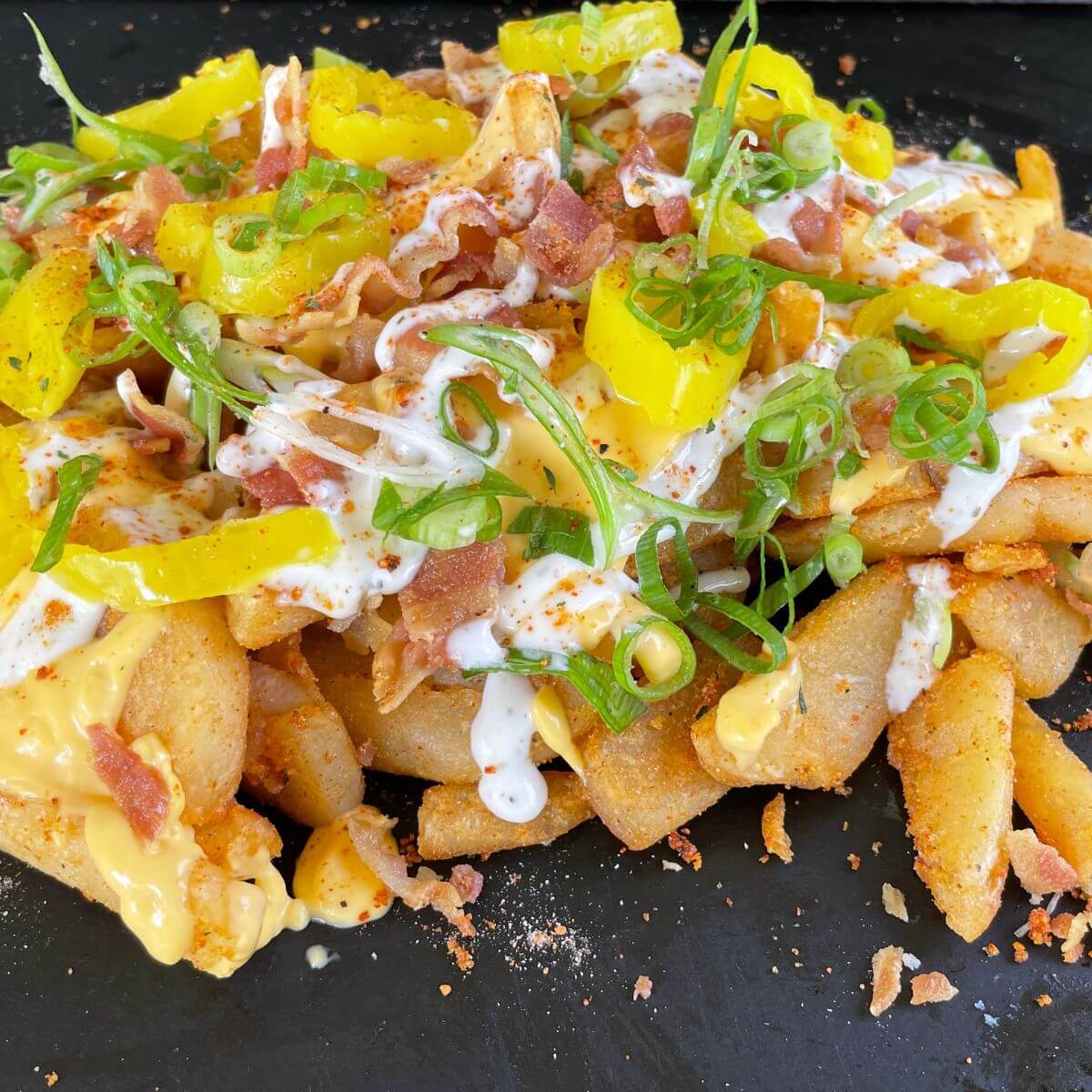 Easy Loaded Cheese Fries on the Griddle (with Frozen French Fries)