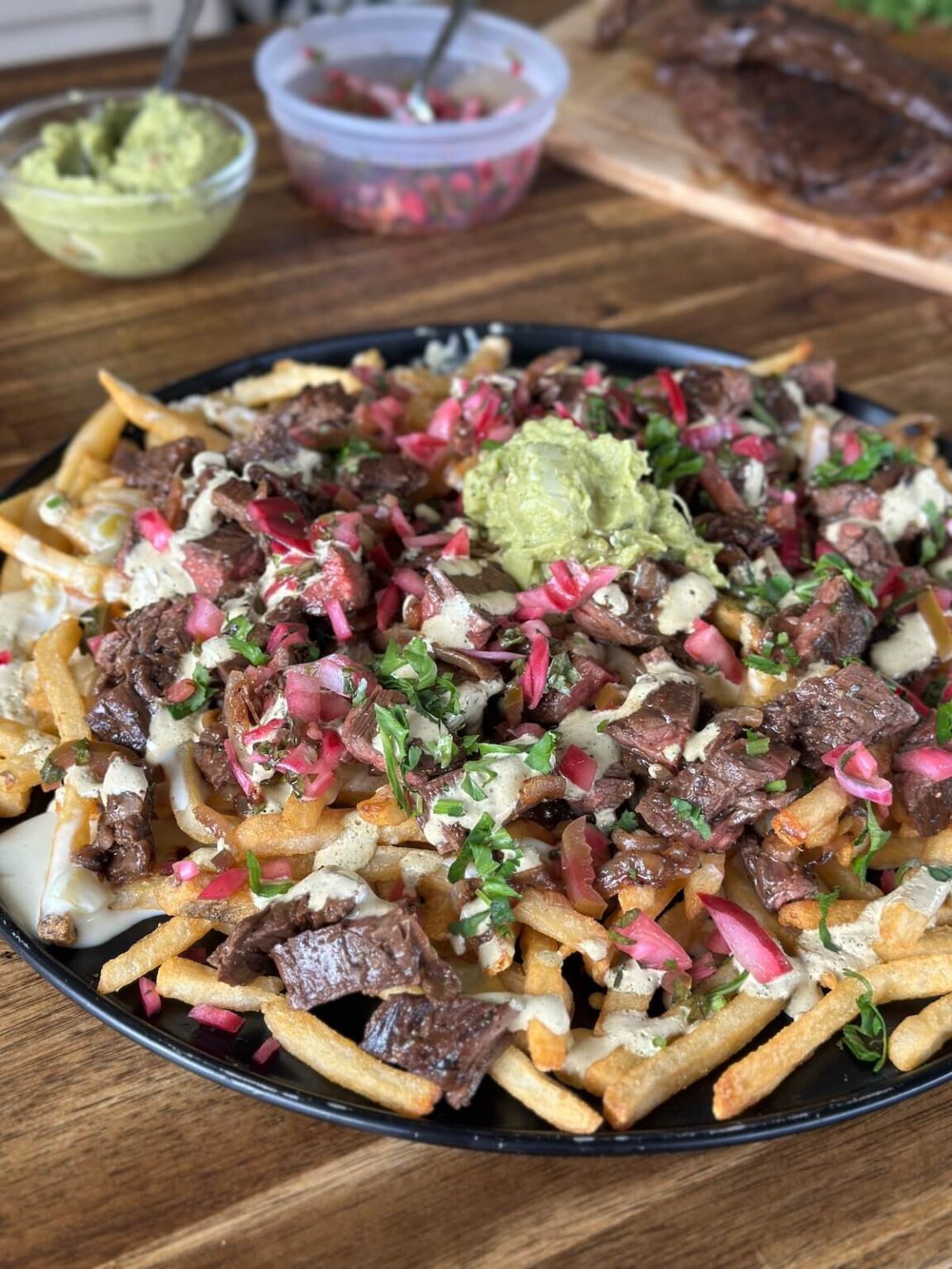 Carne Asada Fries with Homemade Marinade and Queso - The Flat Top King